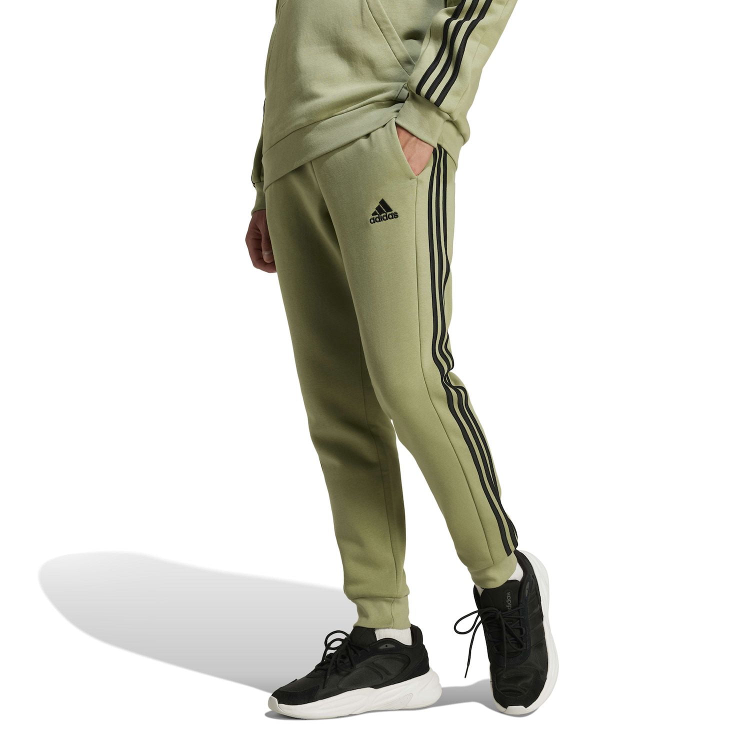 Men's adidas Essentials Fleece 3-Stripes Tapered Cuff Pants Color: Tent ...