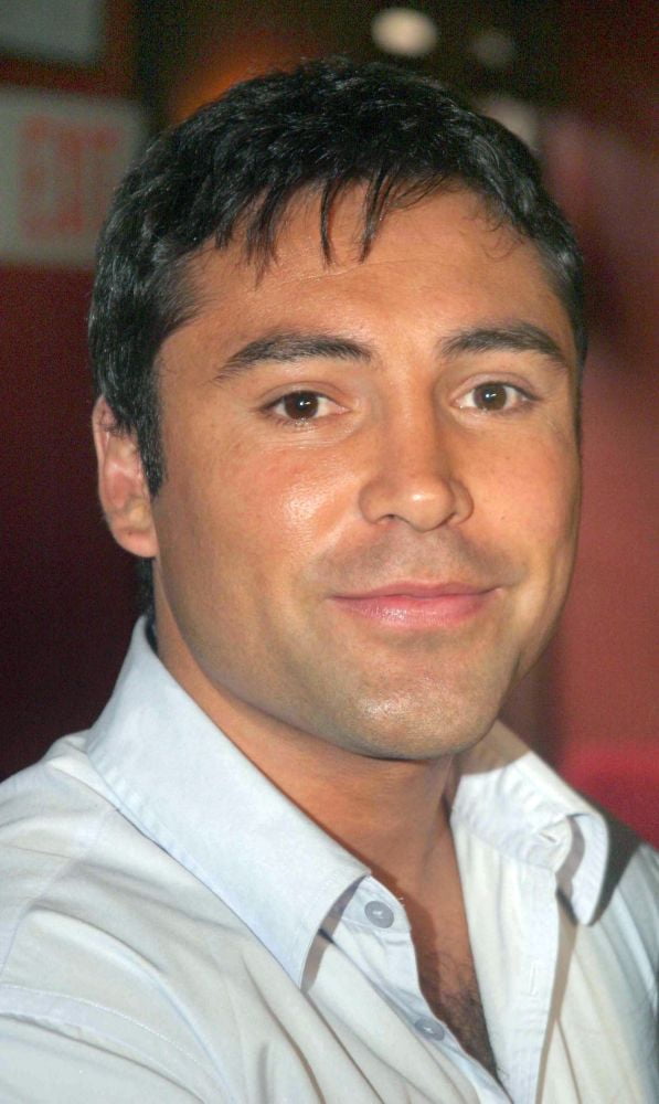 Miami Beach, FL 6-23-2003. Boxer Oscar De La Hoya joins wife, singer ...