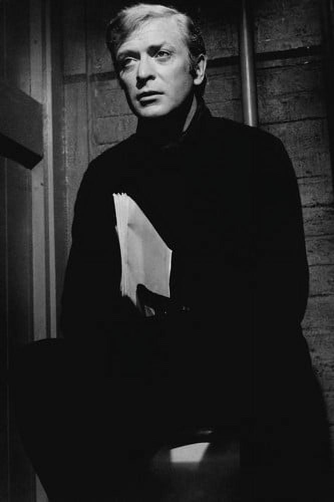 Michael Caine in The Italian Job holding plans sitting on toilet in ...