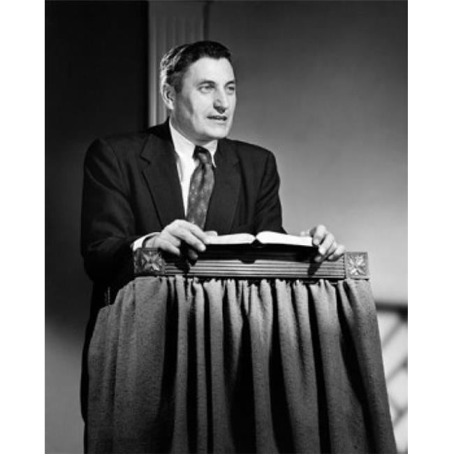 Mid Adult Man Standing at a Lectern & Talking Poster Print - 18 x 24 in ...