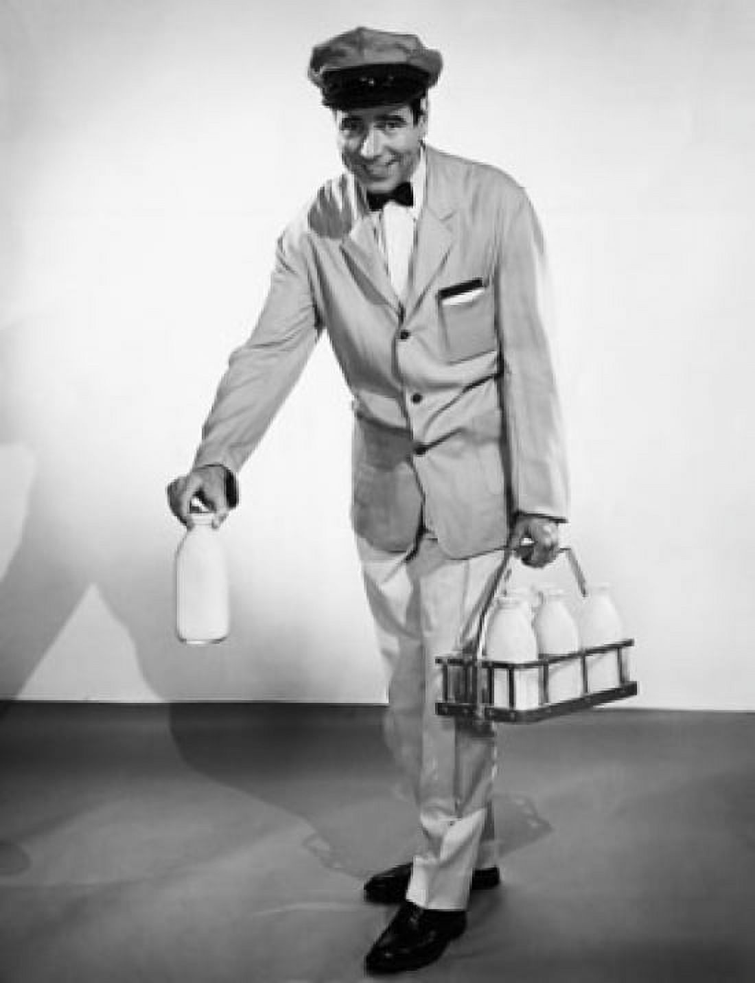 Milkman carrying a basket of milk bottles Poster Print (24 x 36 ...