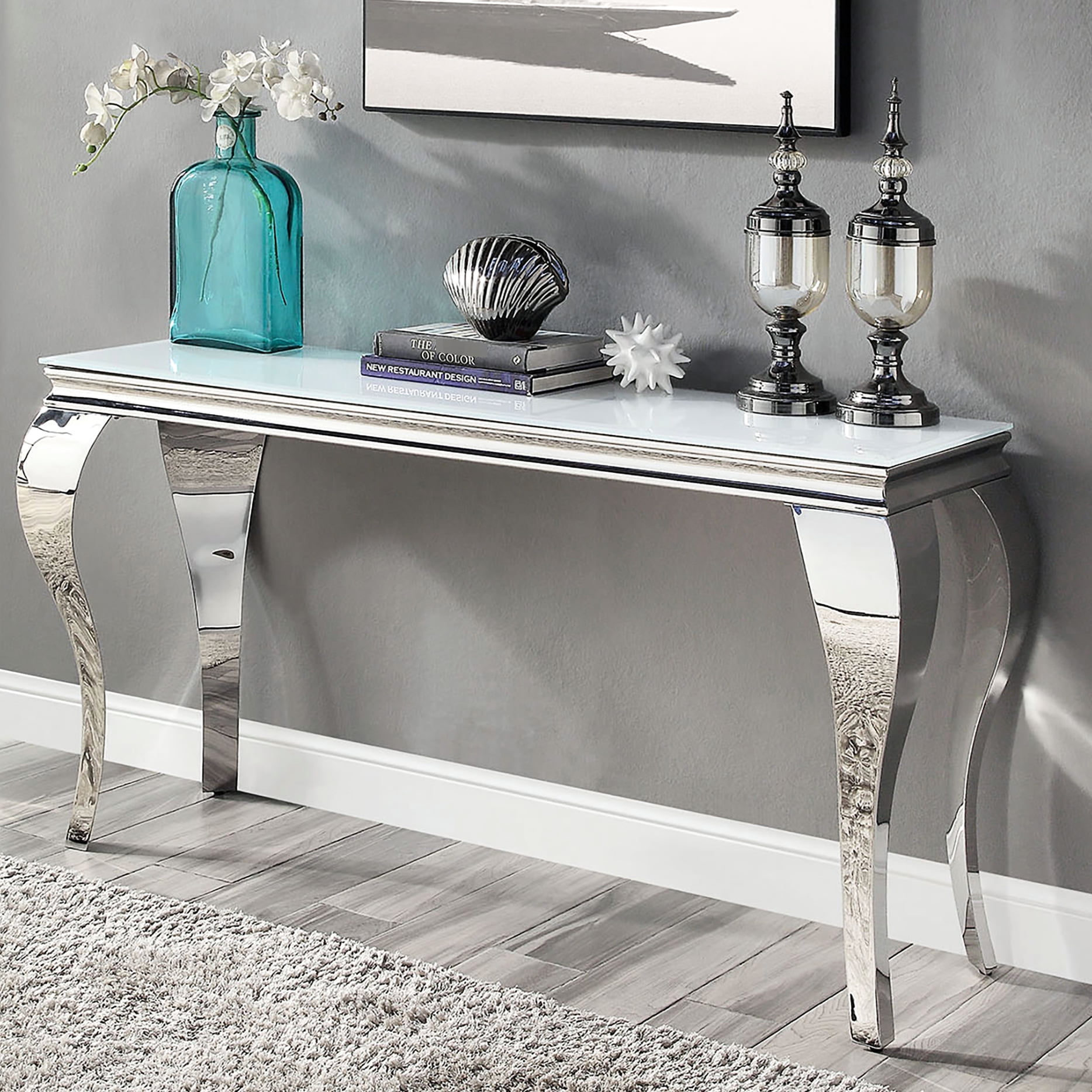Modern Living Area Table With White Glass Surface And Silver Legs In ...