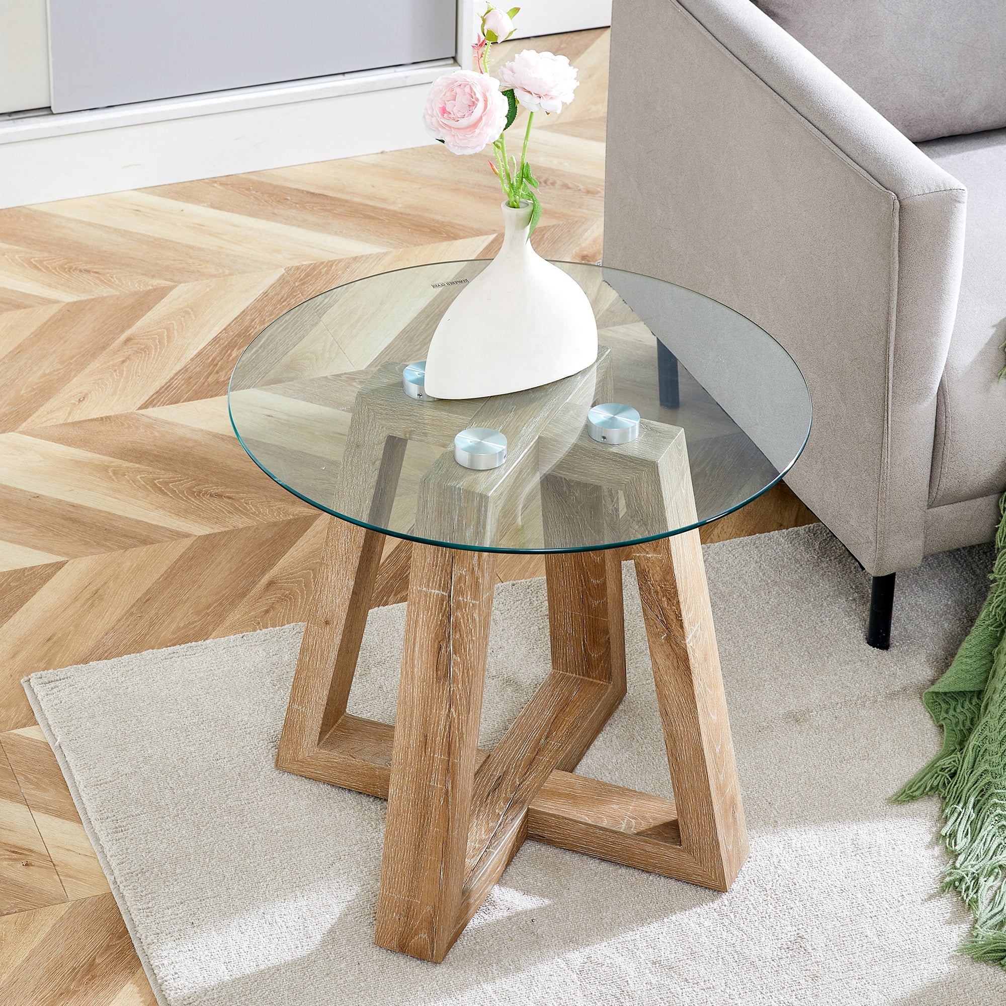 Modern and practical round table. Made of clear tempered glass top and ...