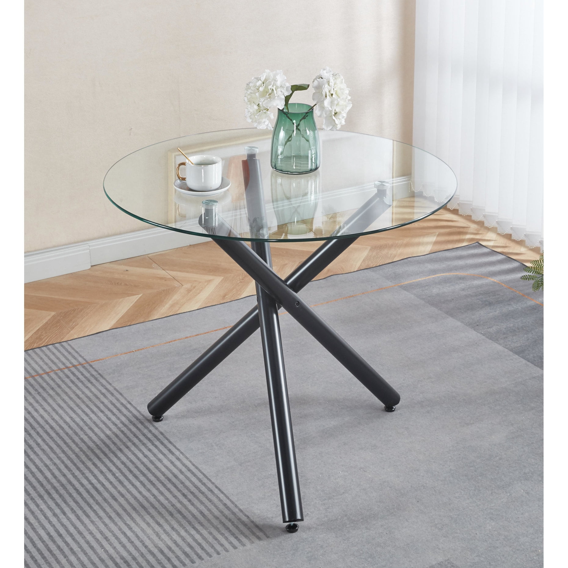 Modern round tempered glass dining table with black metal legs for ...