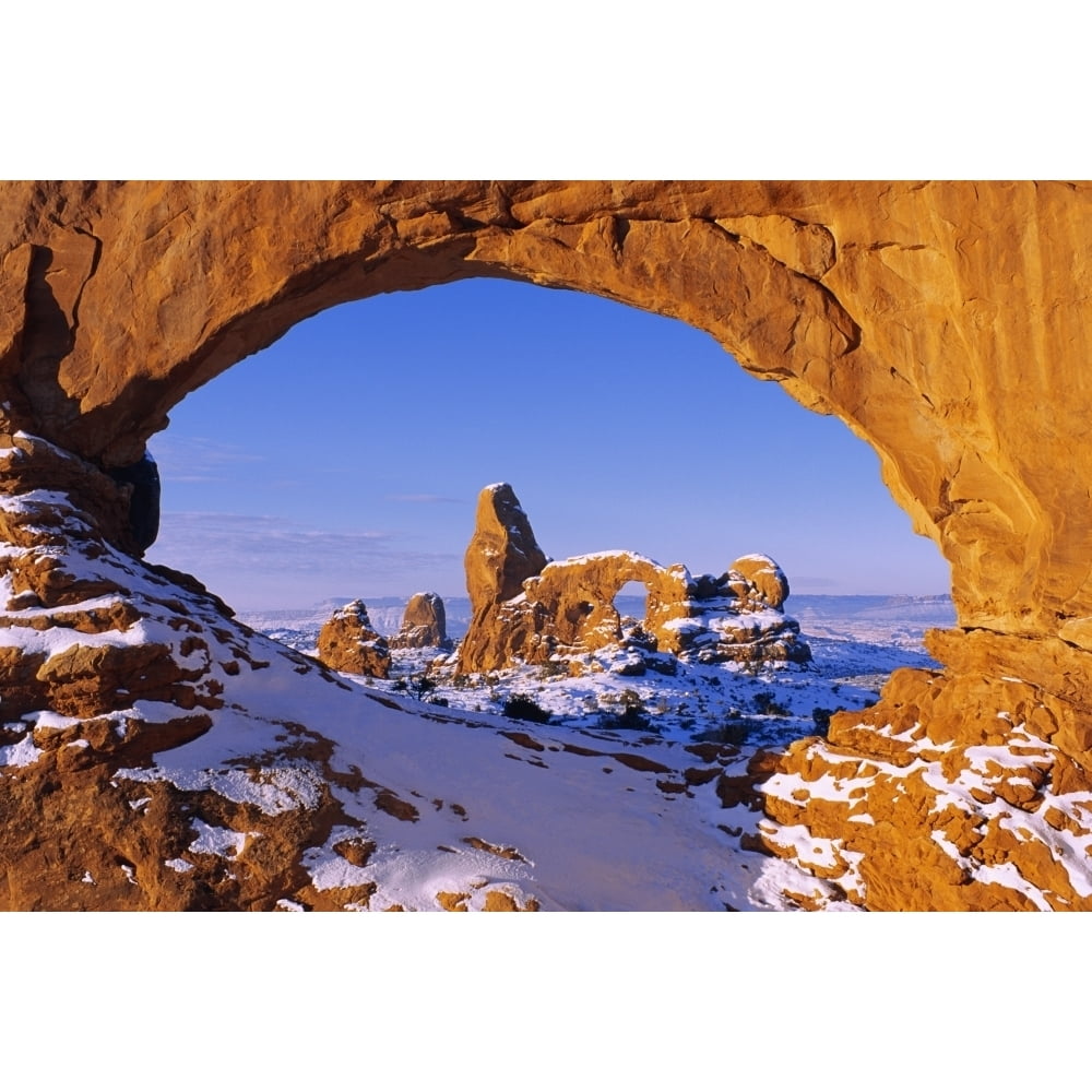 Morning light on North Window framing Turret Arch in winter Arches ...