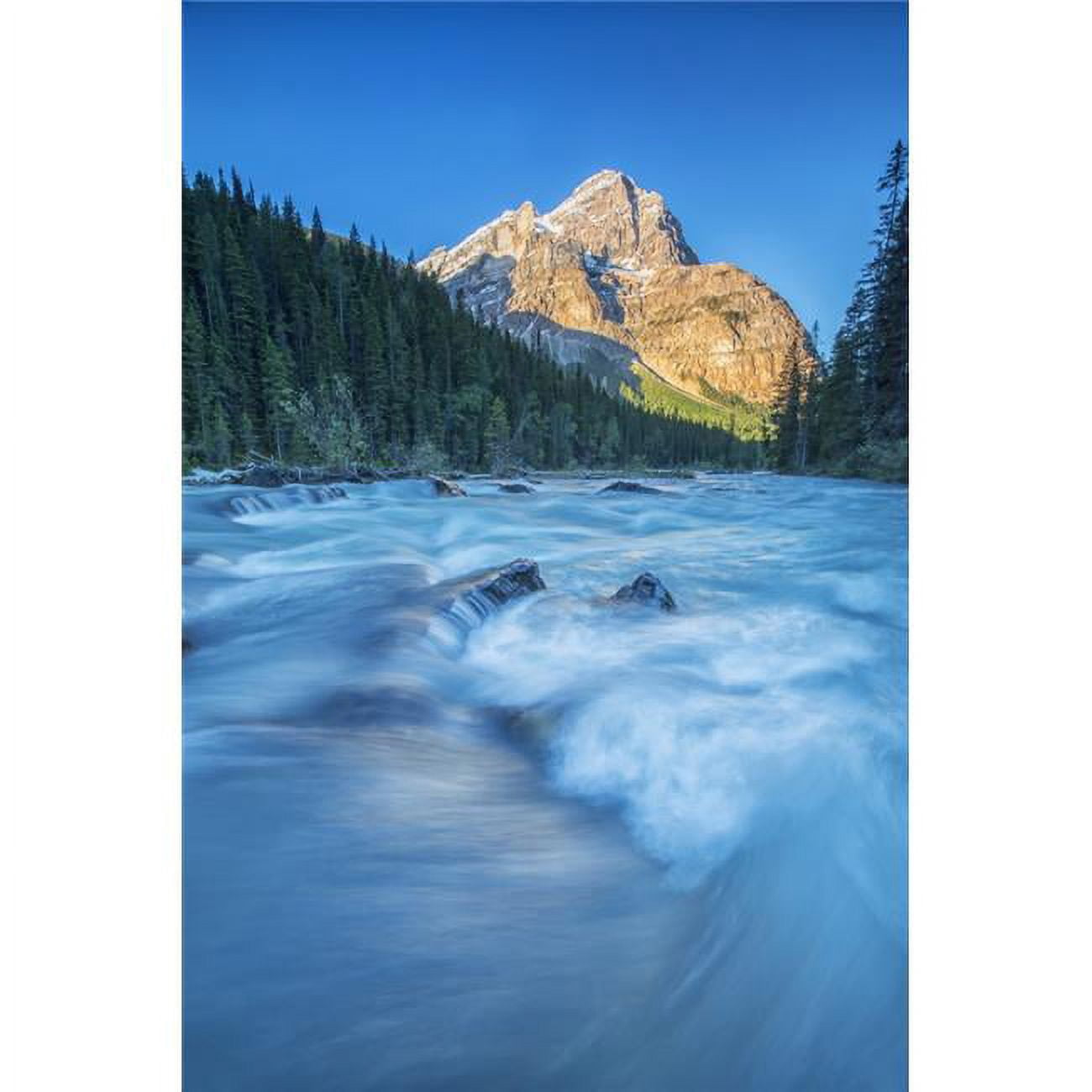 Mount Stephen Lights Up As The Sun Rises While The Yoho River Flows ...