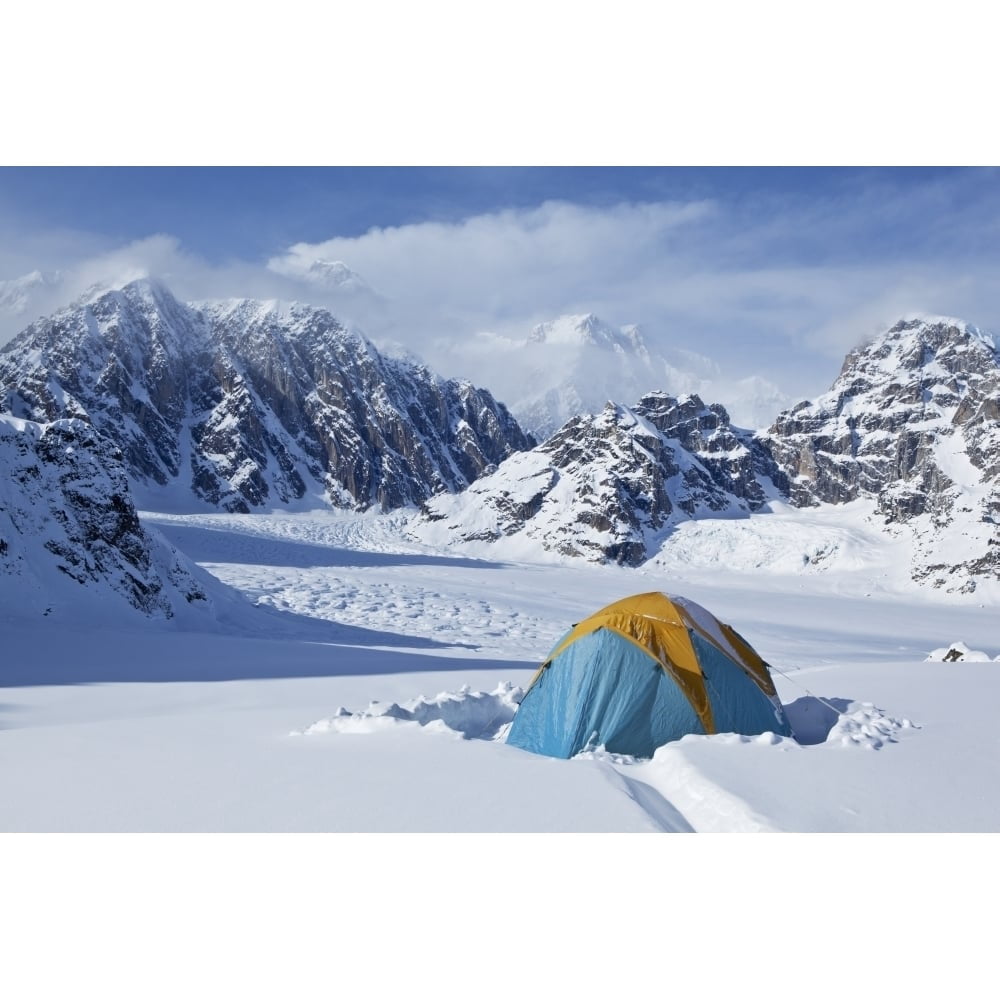 Mountain tent on ridge in winter Mt. McKinley in background part of Mt ...