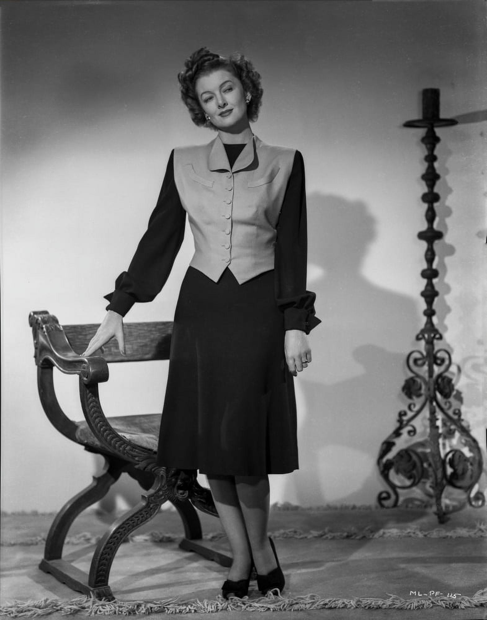 Myrna Loy standing in Long Sleeve Dress with Vest Photo Print (8 x 10 ...