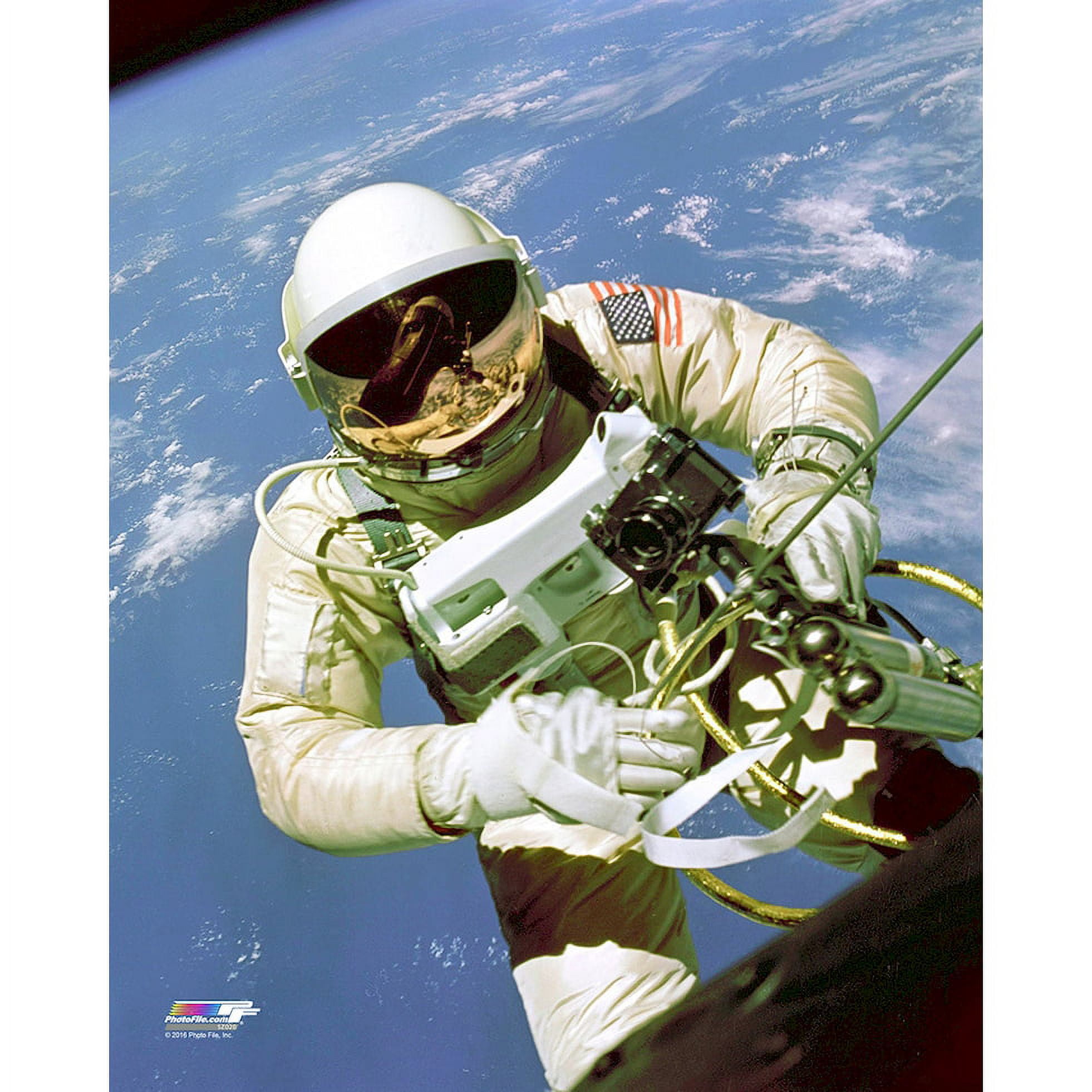 NASA Astronaut Ed White floats out of the hatch of his Gemini 4 capsule June 3, 1965 in space ...