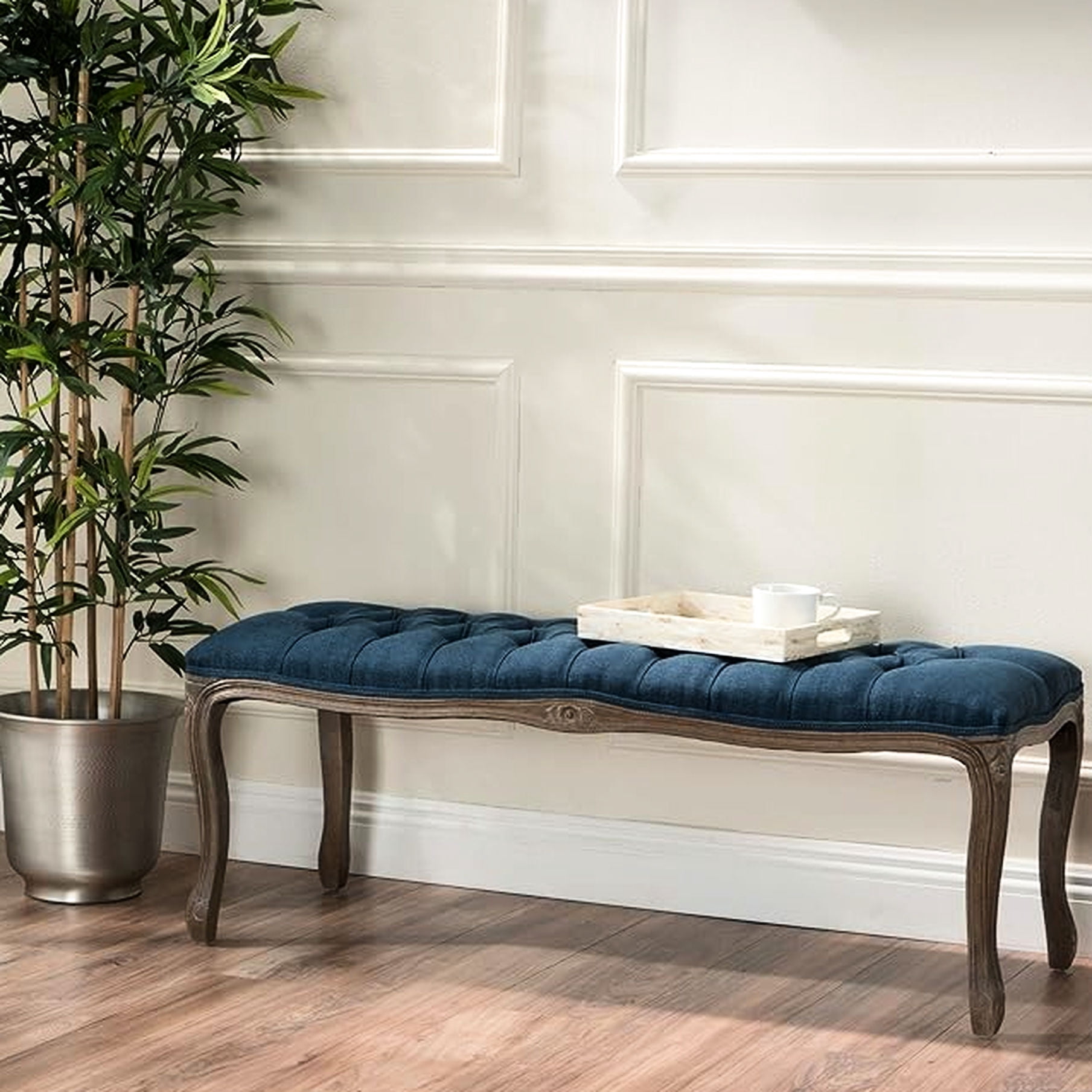 Navy blue fabric bench with plush cushion for foot resting and extra ...