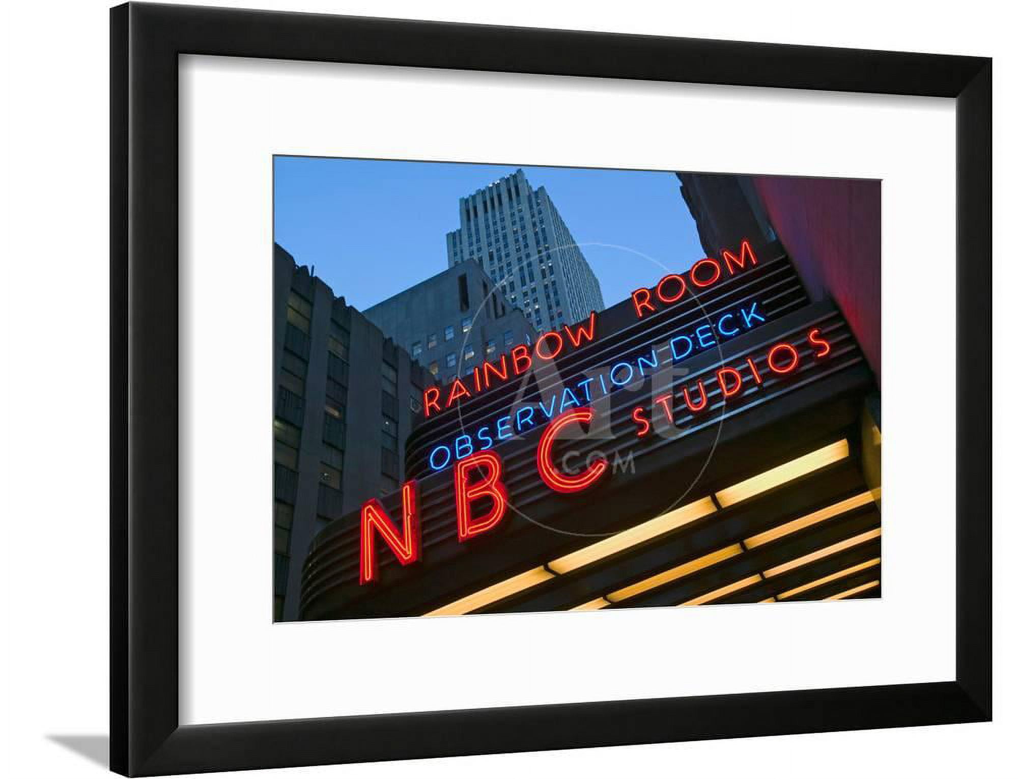Neon lights of NBC Studios and Rainbow Room at Rockefeller Center, New ...