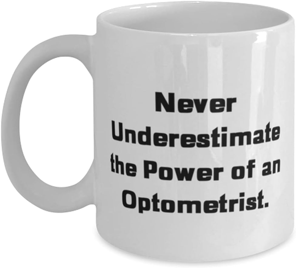 Novelty Never Underestimate the Power of an Optometrist. Mug ...