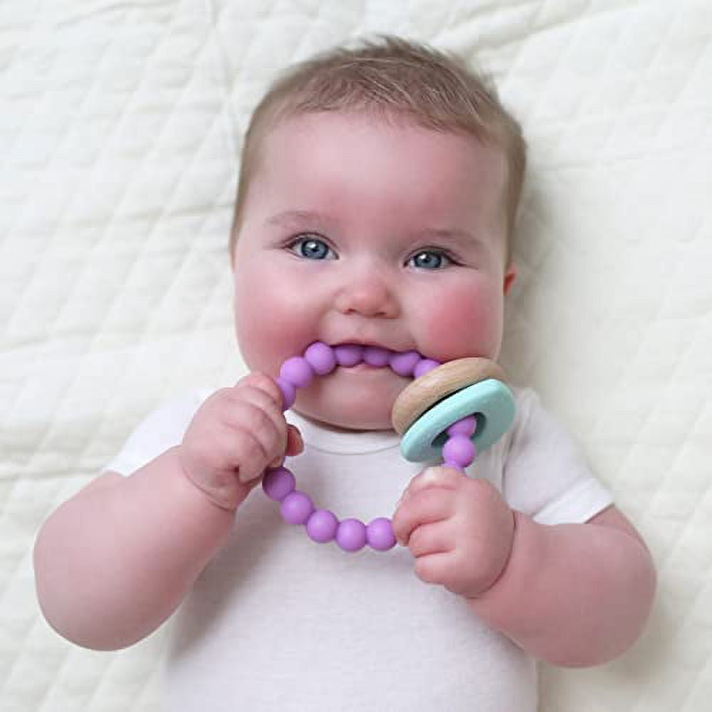 Nuby Natural Wood & Silicone Teether: 3 M+, Heart Bracelet, Pink ...