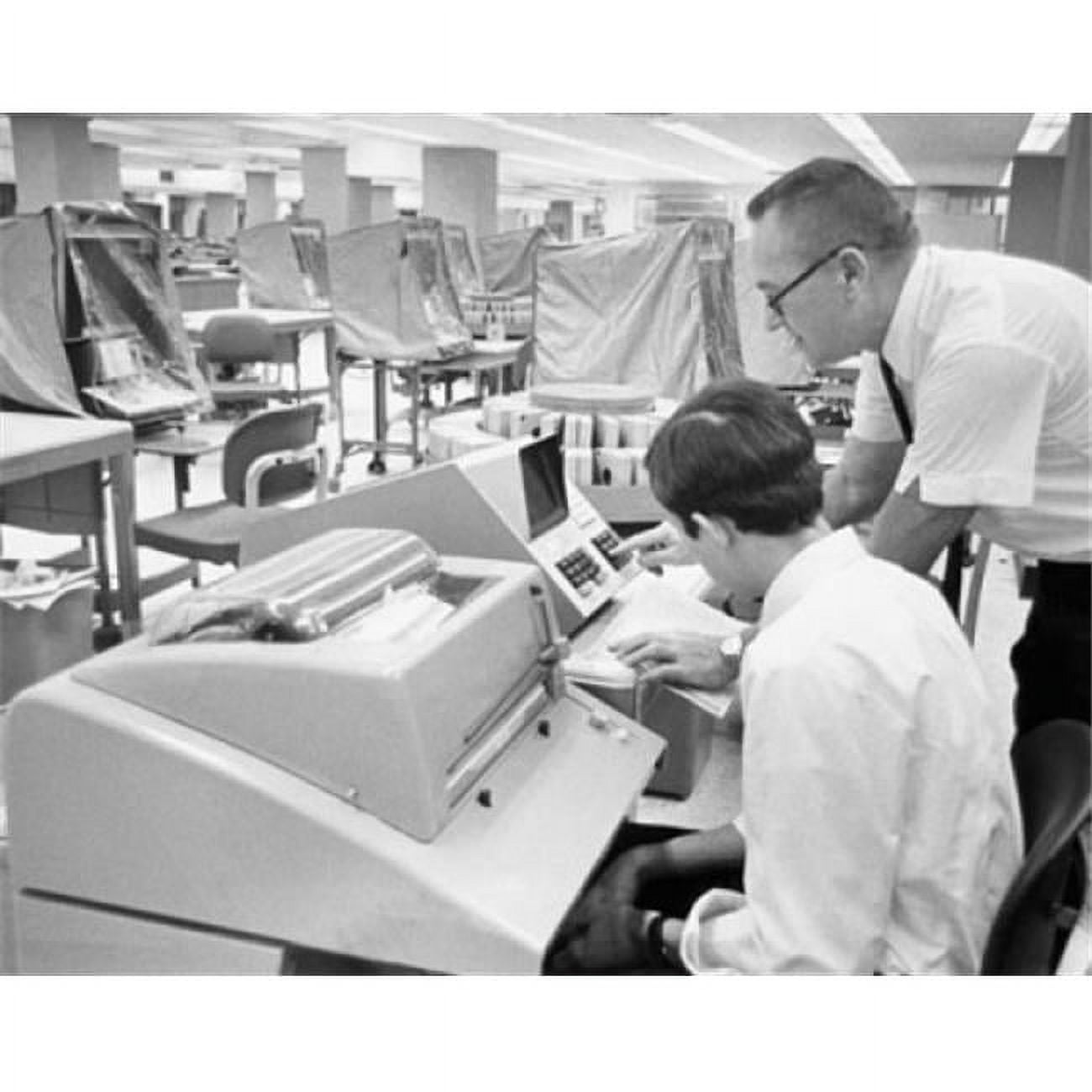 Office Worker Demonstrates the Computer Interrogation Device for ...