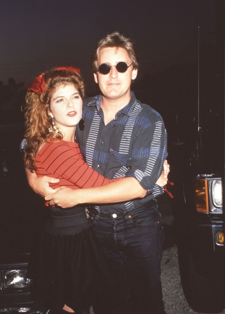 Olivia Barash In Black Skirt And Red Striped Shirt Hugging Emilio ...