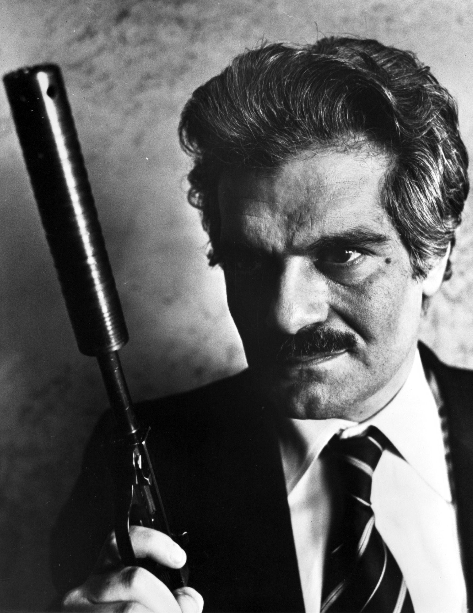 Omar Sharif holding a gun Photo Print (24 x 30) - Walmart.com