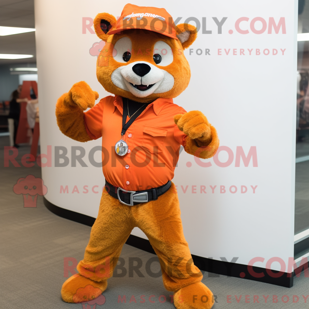 Orange Mongoose REDBROKOLY mascot costume character dressed with a Flare Jeans and Cufflinks ...