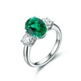 Oval Cut Lab-Created Emerald and Moissanite Engagement Ring in 925 ...