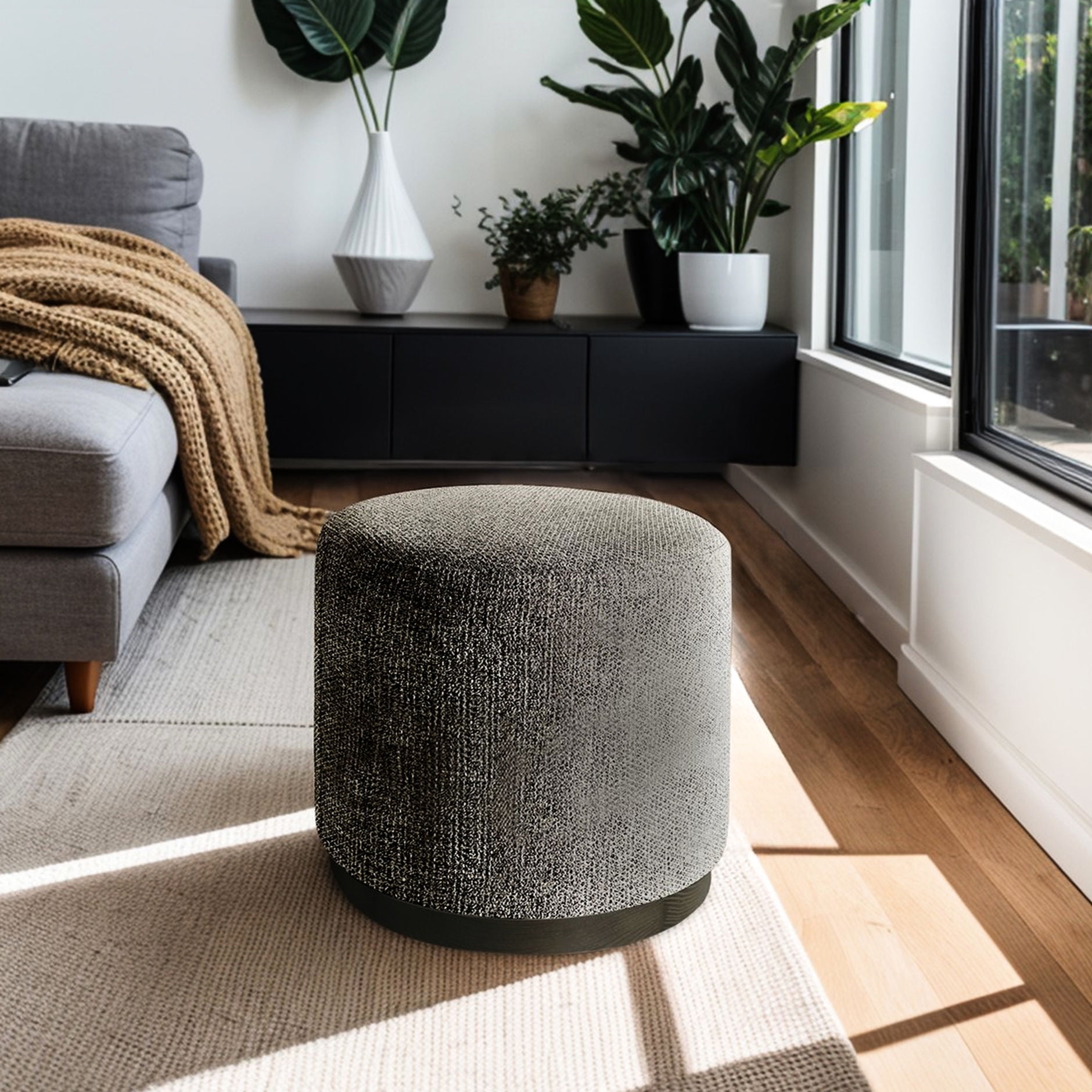 Oval brown ottoman upholstered with high density foam and red oak base ...