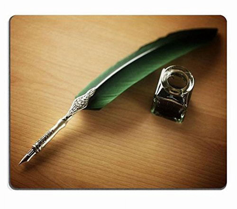 POPCreation Quill pen and ink well resting on a desk concept for ...