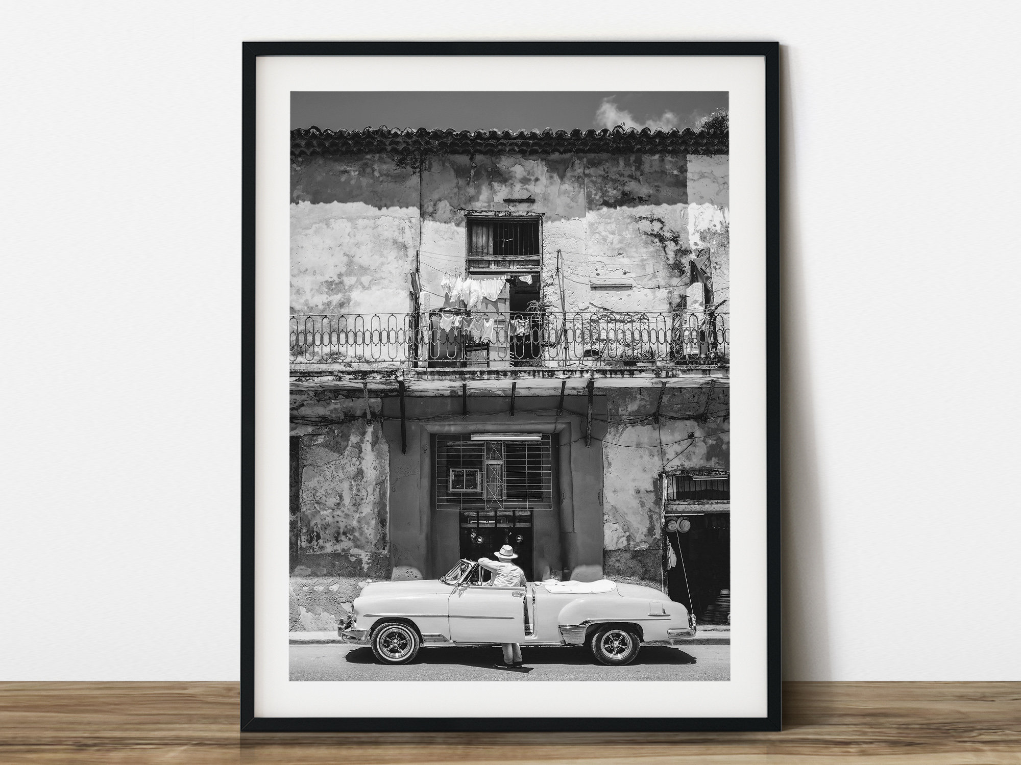 POSTER A driver waiting at old car in Havana black and white street ...