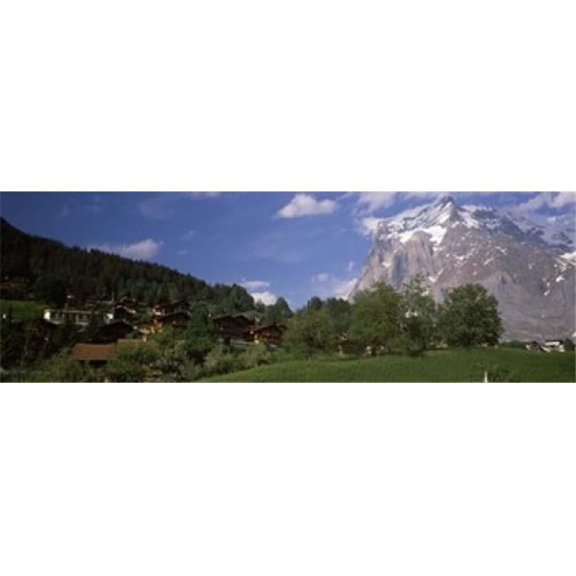 Panoramic Images Buildings in a village Mt Wetterhorn Grindelwald Bernese Oberland Berne Canton ...