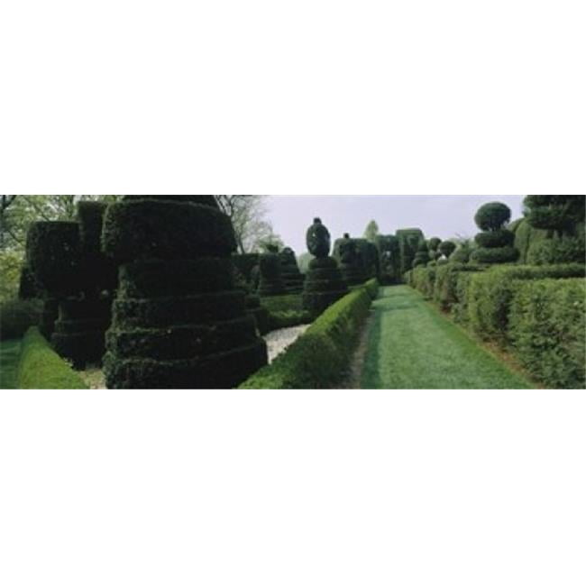 Panoramic Images Sculptures formed from trees and plants in a garden ...