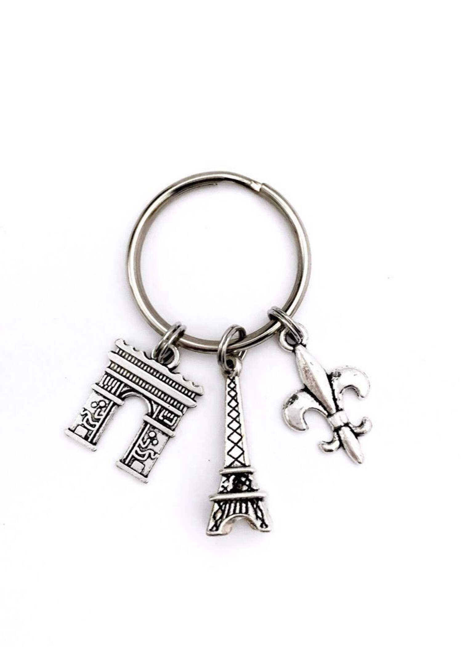 Paris France themed keychain. Includes Eiffel Tower, Arc de Triomphe ...