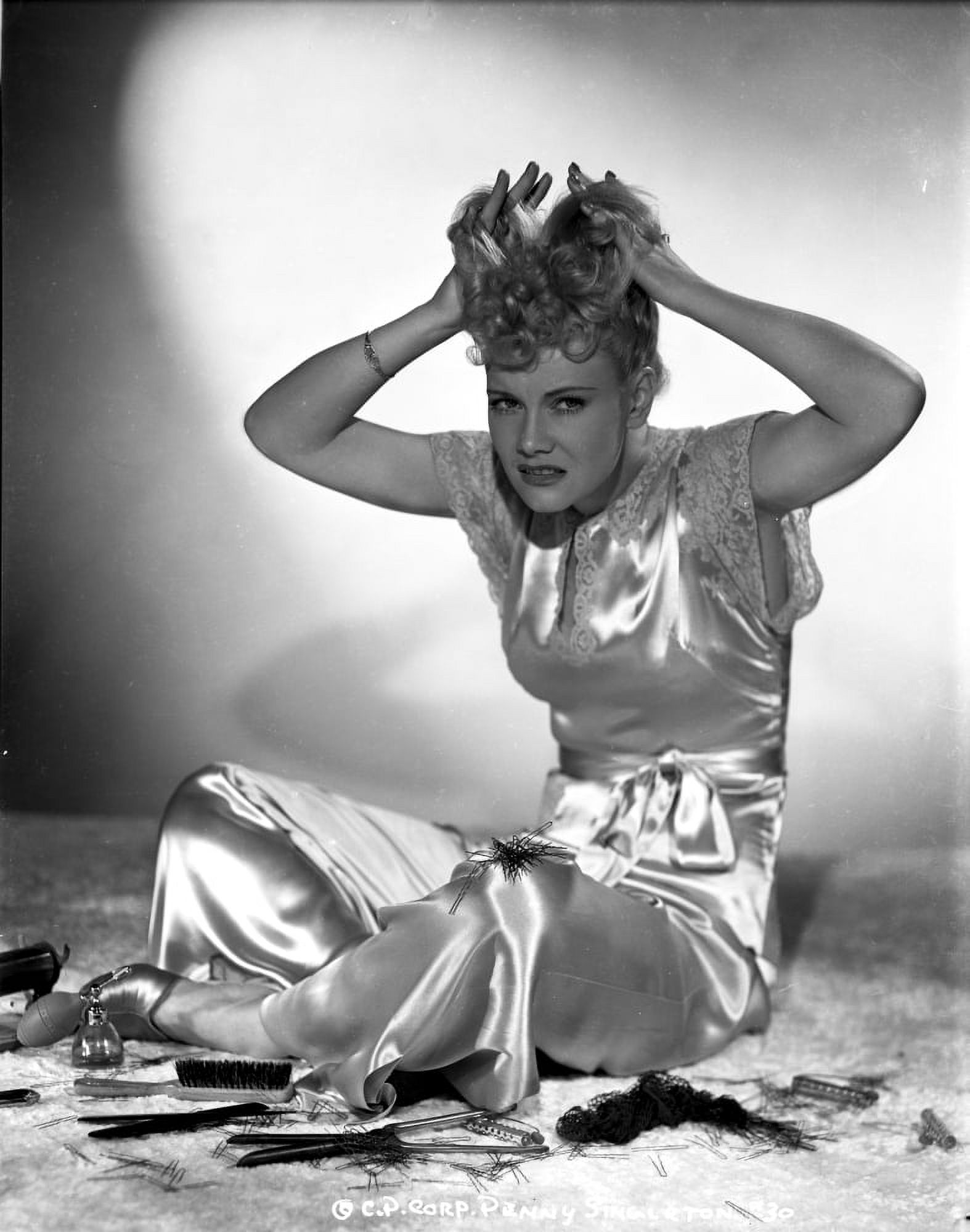 Penny Singleton Seated wearing Silk Dress with Hands on top of Head ...