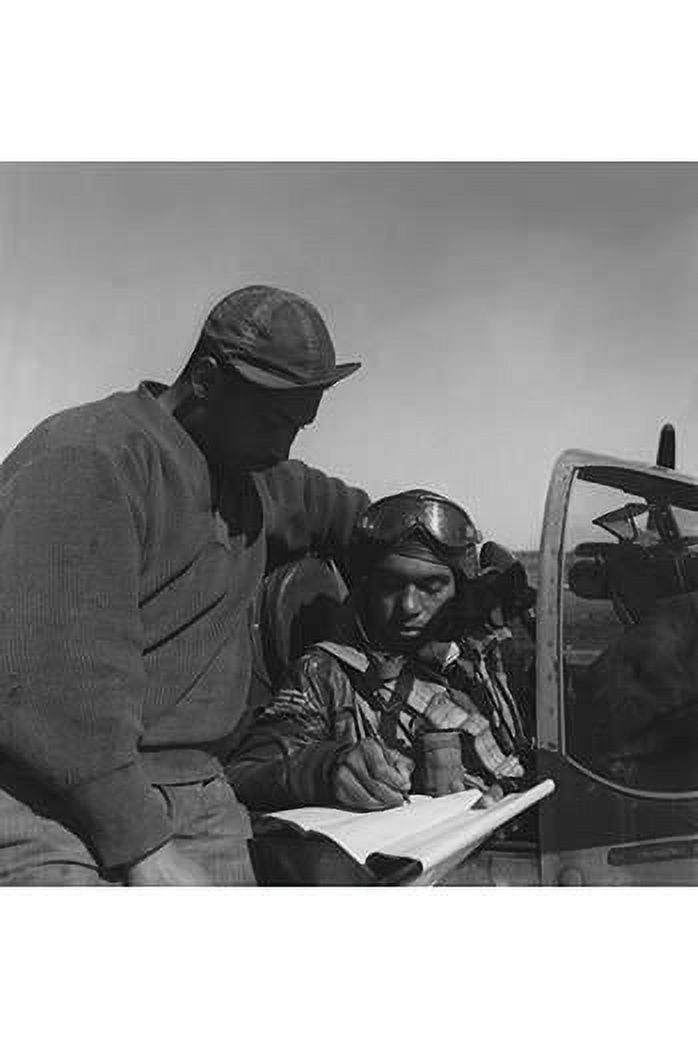 Photograph shows a pilot from the 332nd Fighter Group signing the Form ...