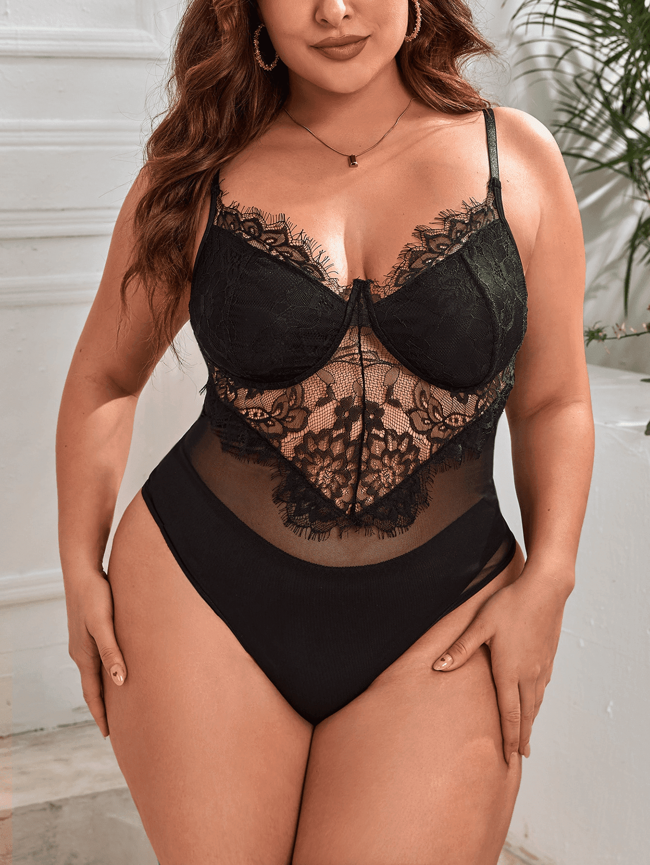 Plus Size Black Lace Bodysuit features a sexy sheer floral mesh design, with underwire and ...