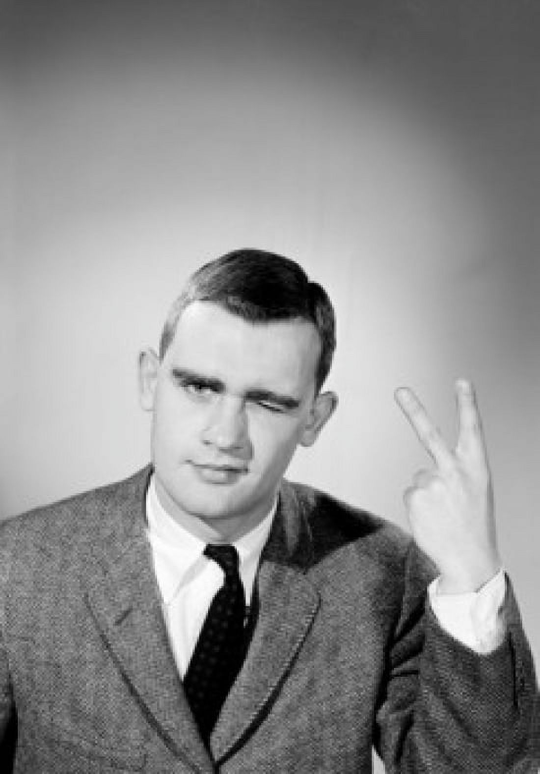 Portrait of young man winking and showing peace sign Poster Print (24 x ...