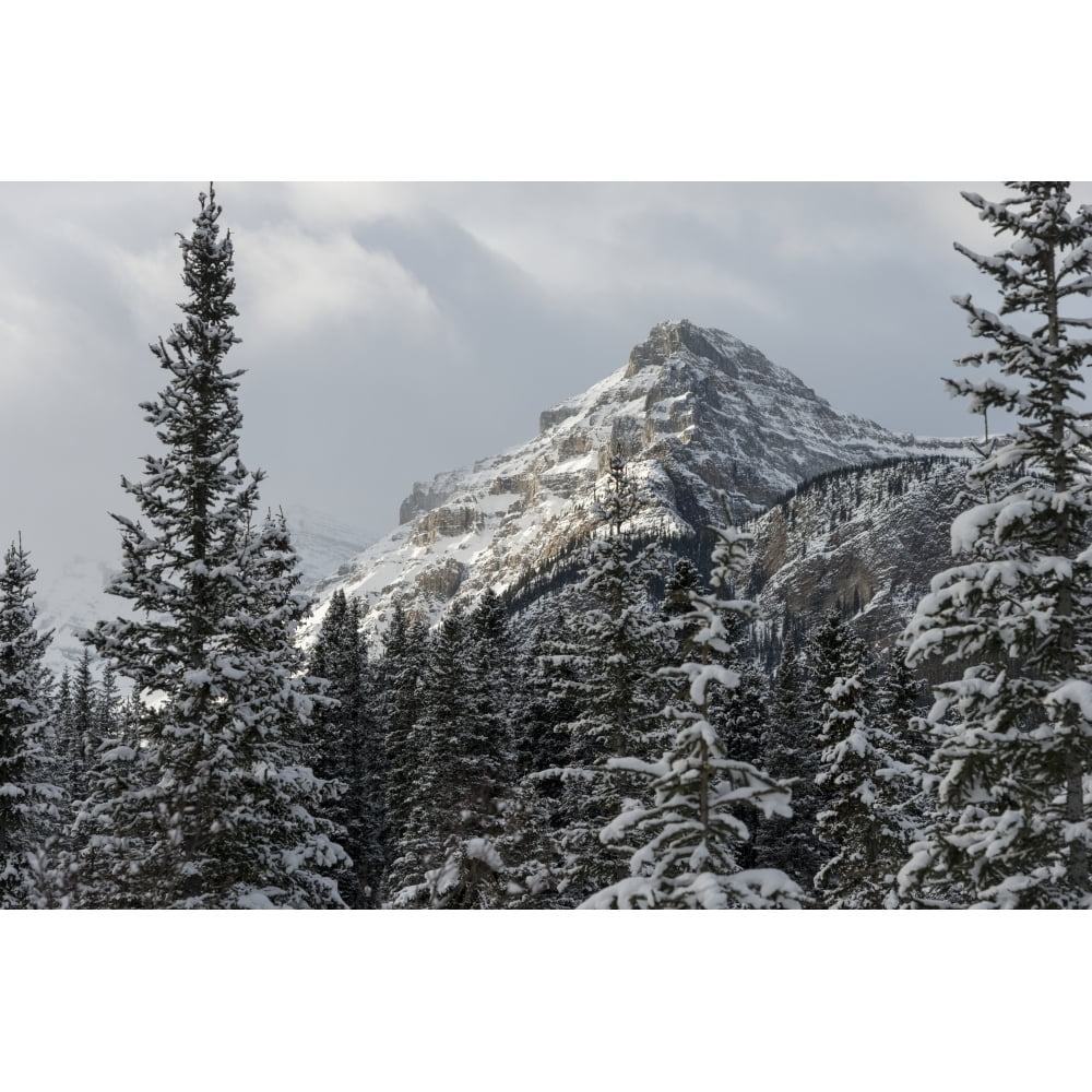 Posterazzi DPI12285065 Rugged Mountain Peak with Snow Under A Cloudy ...