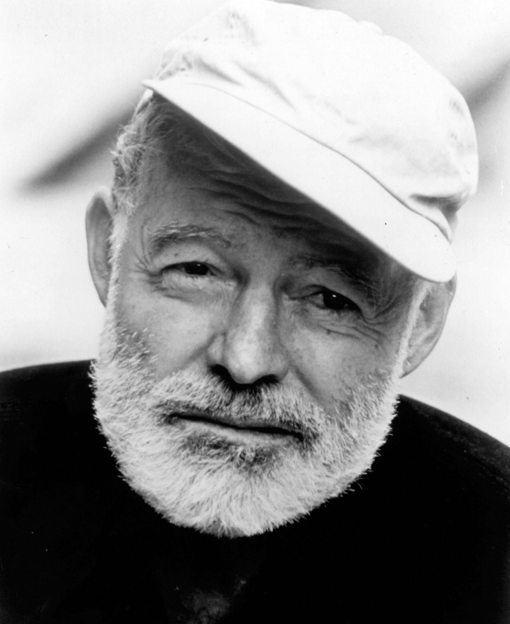 Posterazzi Ernest Hemingway Wearing a Baseball Cap Photo Print 10" x 8 ...