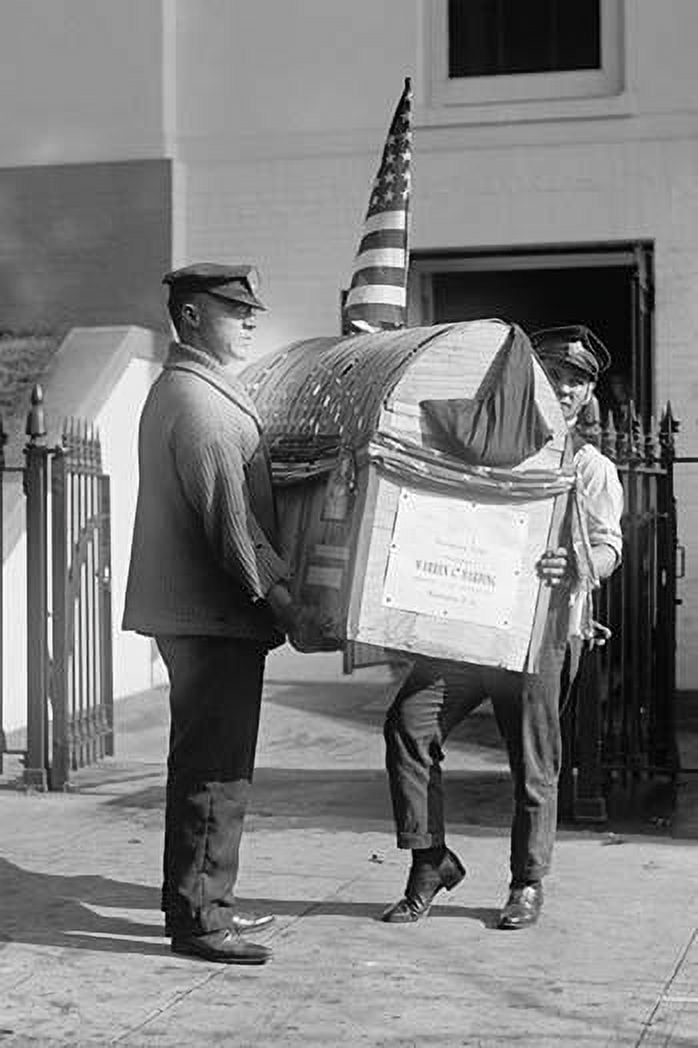 Postman delivers Harding Turkey Delivered to the White House in a huge box that he can barely ...