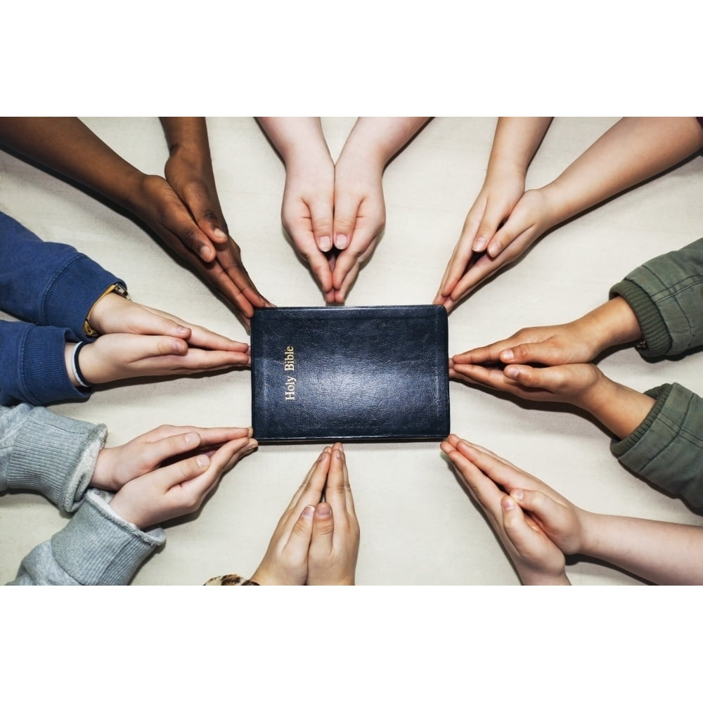 Praying Hands Pointing To A Bible Poster Print by Craig Tuttle / Design ...
