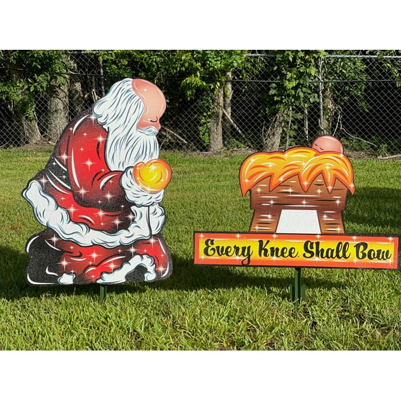 Kneeling Santa Over Baby Jesus