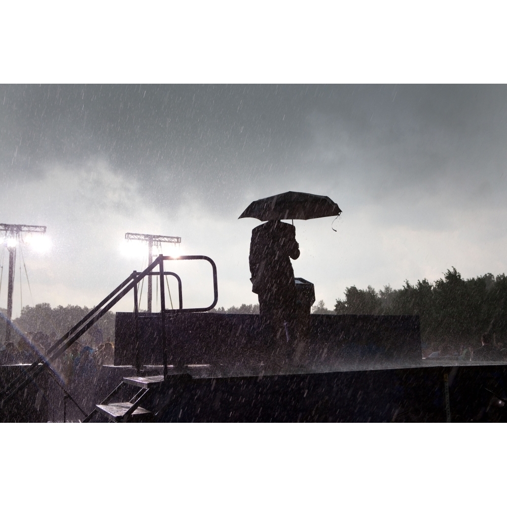 President Barack Obama In The Rain At A Memorial Day Ceremony At ...