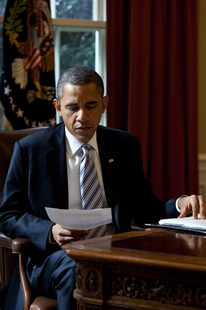 President Barack Obama Reads A Document In The Oval Office History (24 ...