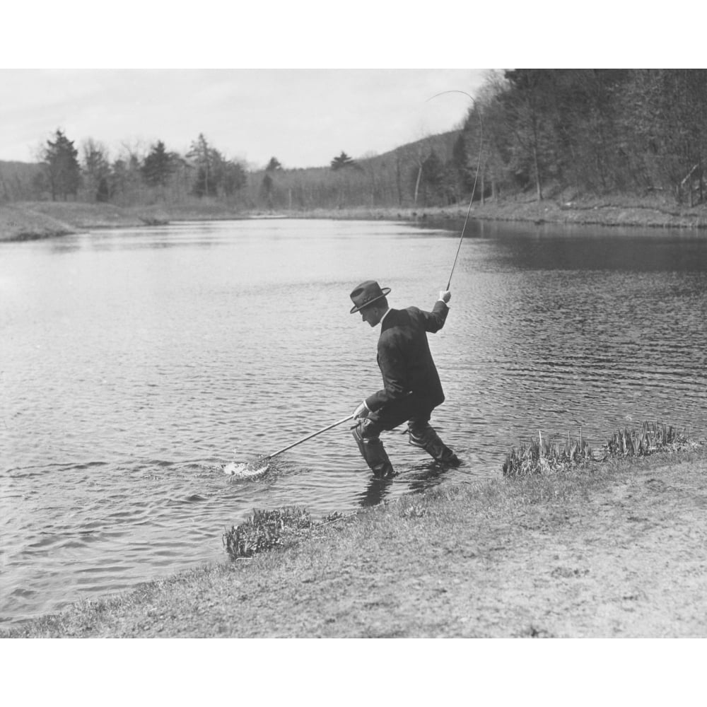 President Calvin Coolidge Fishing With A Rod And Net In A Pond ...