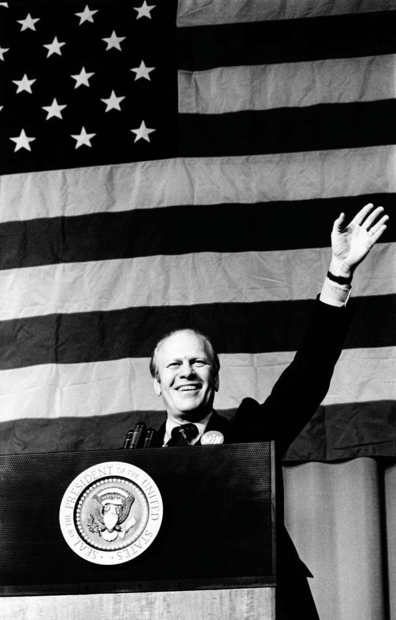President Gerald Ford Waves In Front Of A Large American Flag. He Was ...