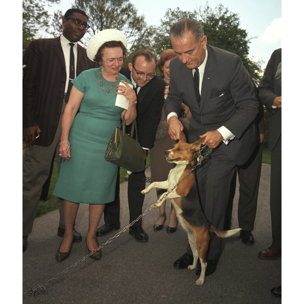 President Lyndon Johnson Holds His Beagle Up By The Ears As Members Of ...