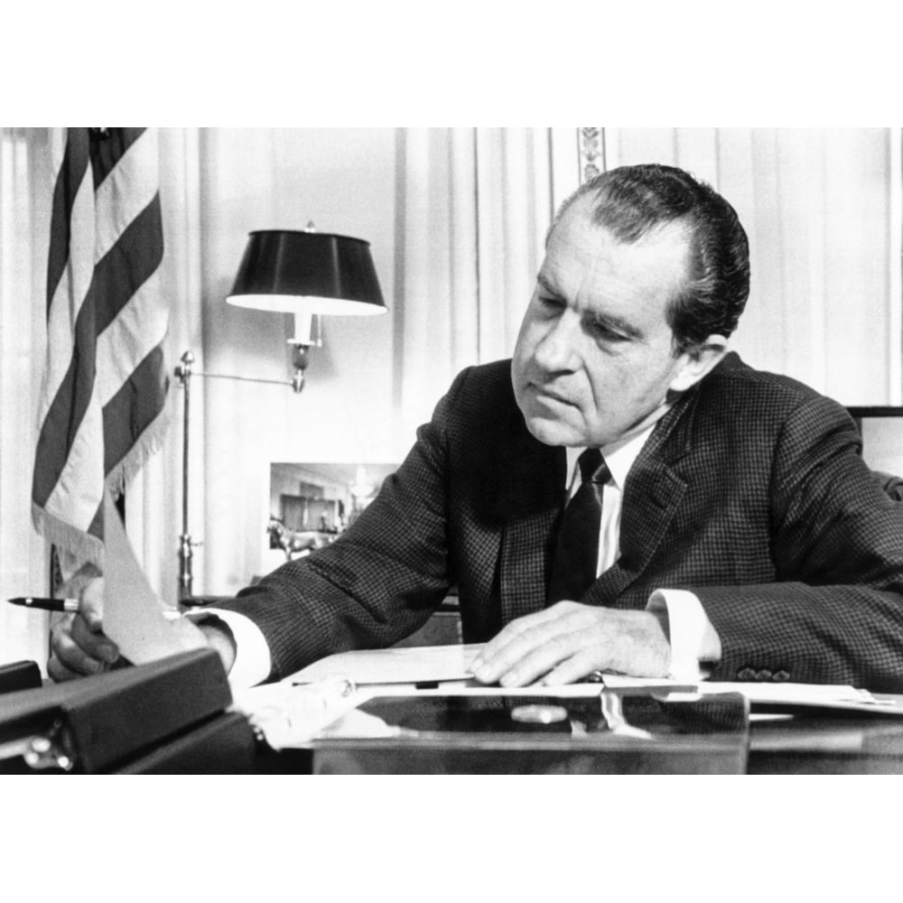 President Richard Nixon In His Office At The White House Studying ...