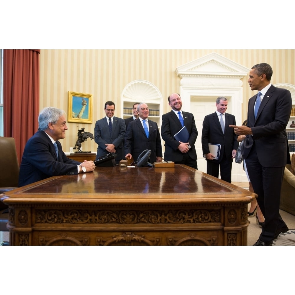President Sebastian Pinera Of Chile Sits At The Obama'S Resolute Desk ...