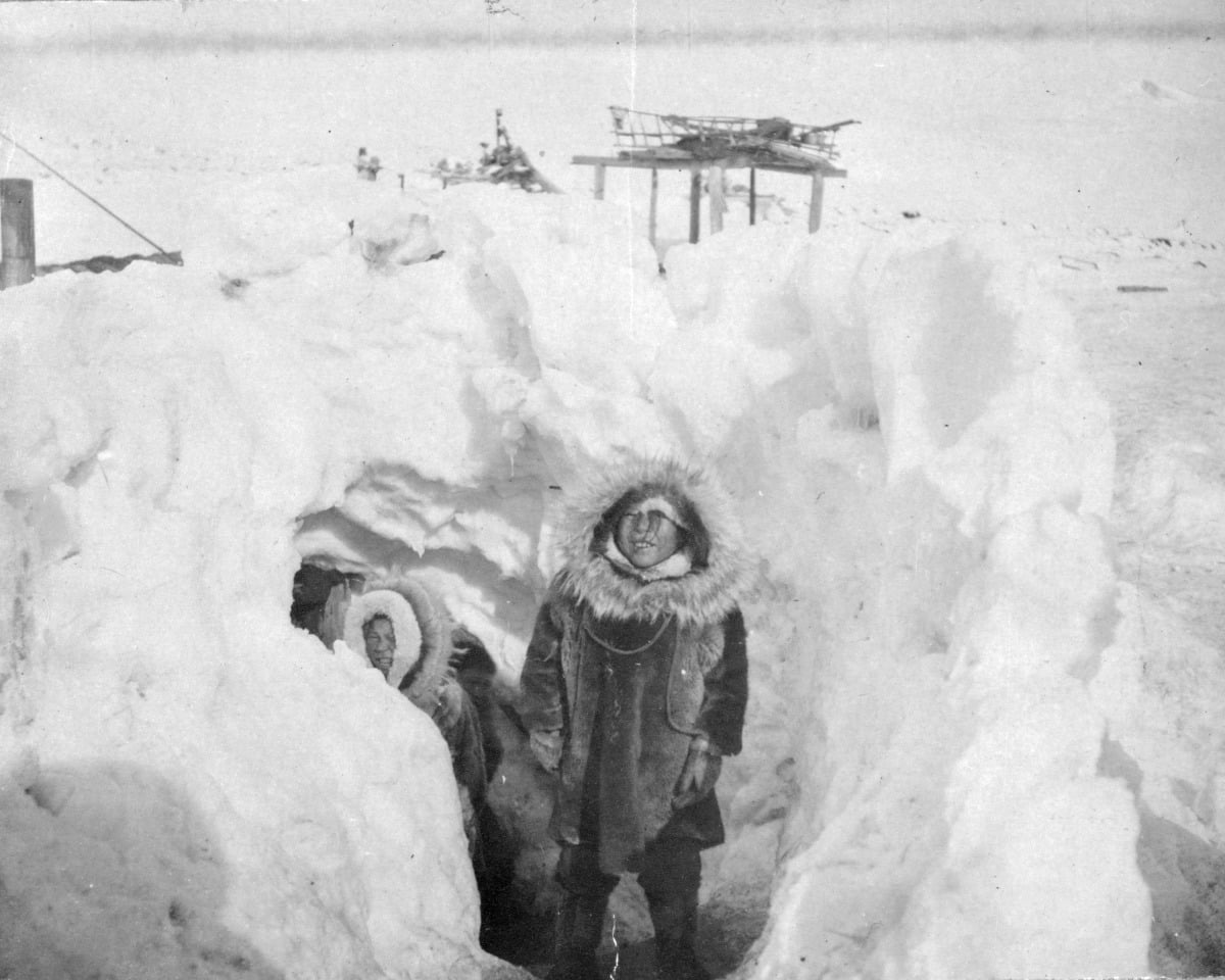 Print: Alaskan Eskimos With Their Winter Home Half Underground In ...