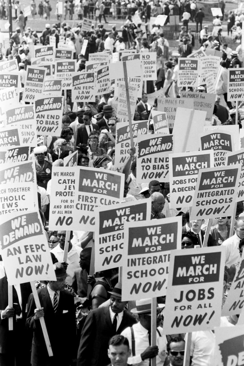 Print: Demonstrators Marching In The Street Holding Signs During The ...