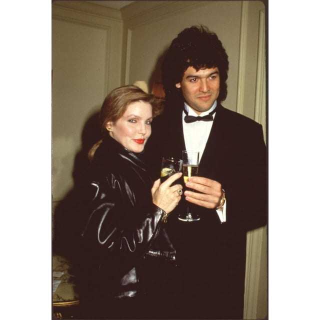 Priscilla Presley In Leather Jacket And Marco Garibaldi In Tuxedo Photo ...