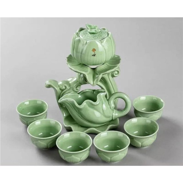 Purple Clay Ceramic Teapot And Teacup Stone Mill Automatic Rotation ...