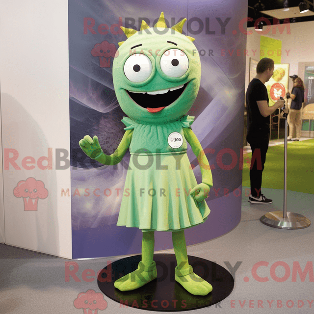 REDBROKOLY mascot character of a Green Cyclops dressed with a Mini ...