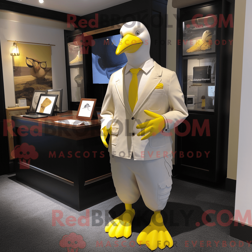 REDBROKOLY mascot character of a Lemon Yellow Gull dressed with a Polo ...